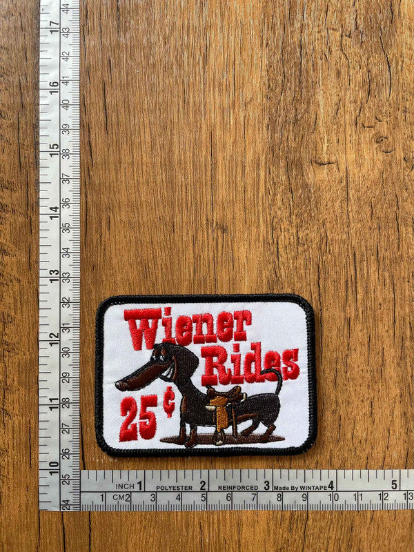 Wiener Rides 25¢ - The Mad Hatter Company
