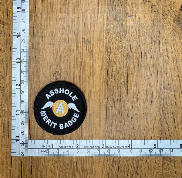 Asshole Merit Badge - The Mad Hatter Company